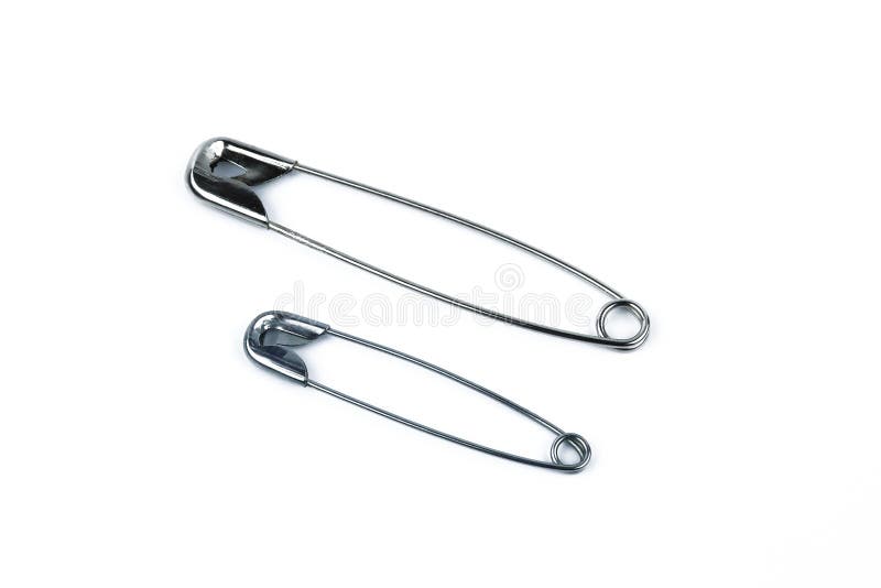 Small and Large Safety Pins Isolated on White Background Stock Photo ...