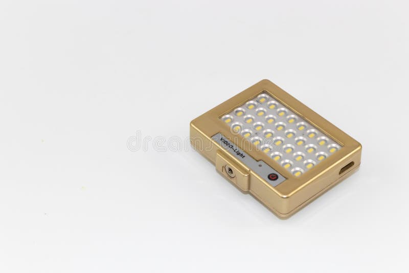 The Small LED Light in Gold Box with Black Stand Leg Stock Image ...