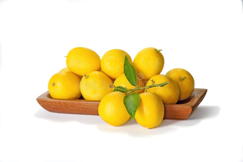 Small Lemons on the Plate I on White Stock Image - Image of gourmet ...