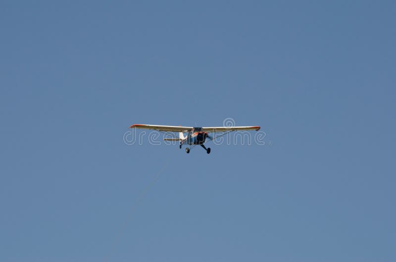 Small Light Plane Flying in the Bright Blue Sky Stock Image - Image of ...