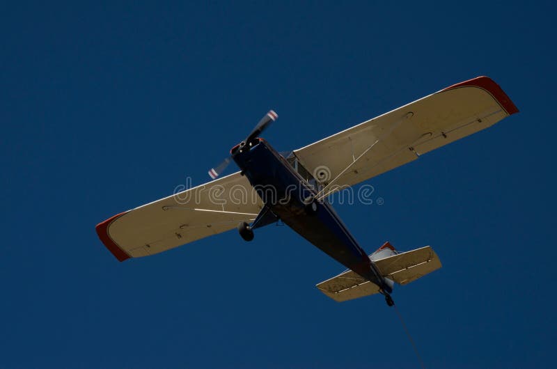 Small Light Plane Flying in the Bright Blue Sky Stock Image - Image of ...