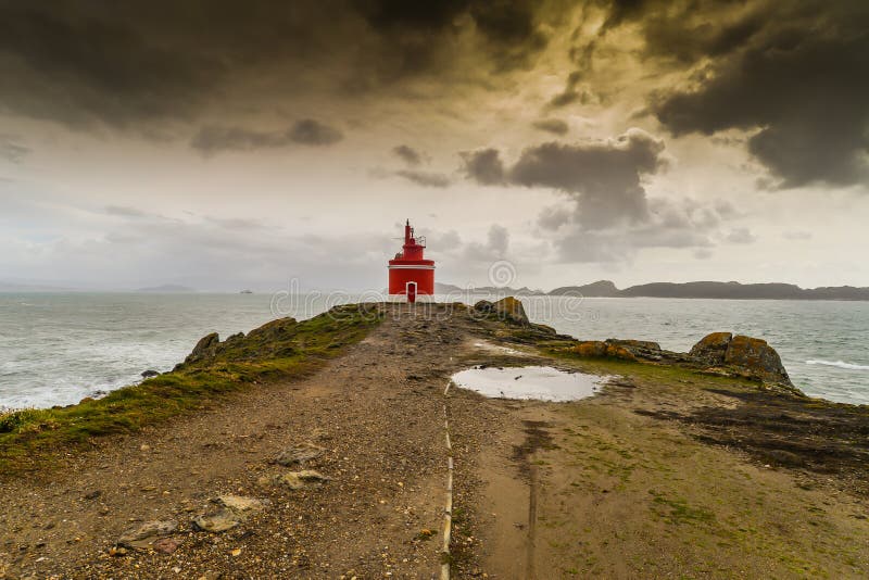 The Lighthouse at Cabo Home Stock Image - Image of colours, green ...