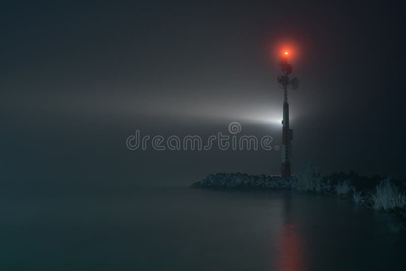 Small Lighthouse in the Lake at Night Stock Image - Image of light ...