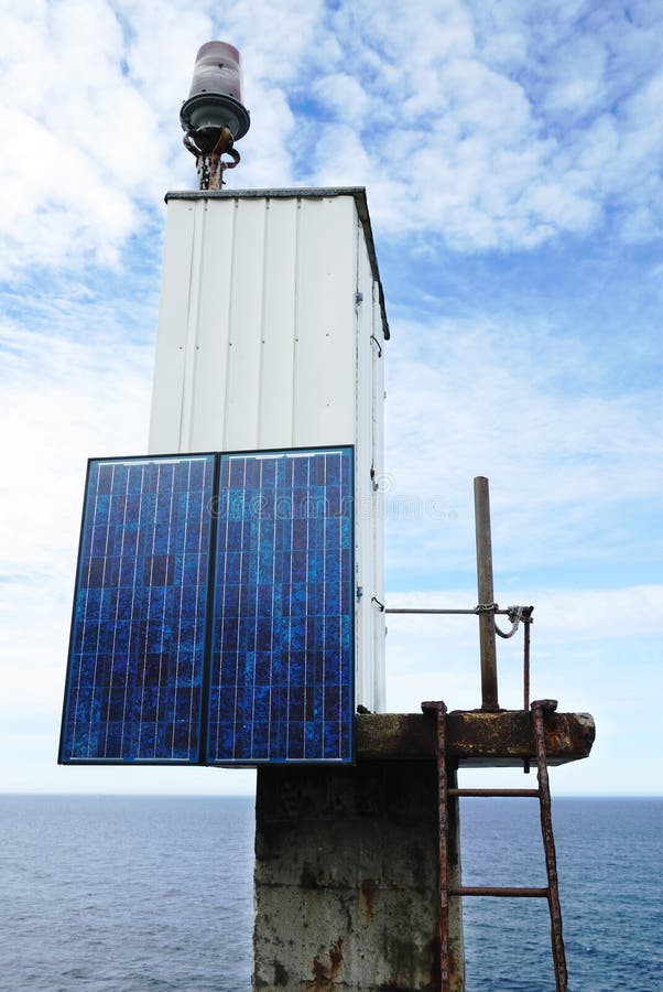 A Small Lighthouse with the Solar Battery. Stock Photo - Image of ocean ...