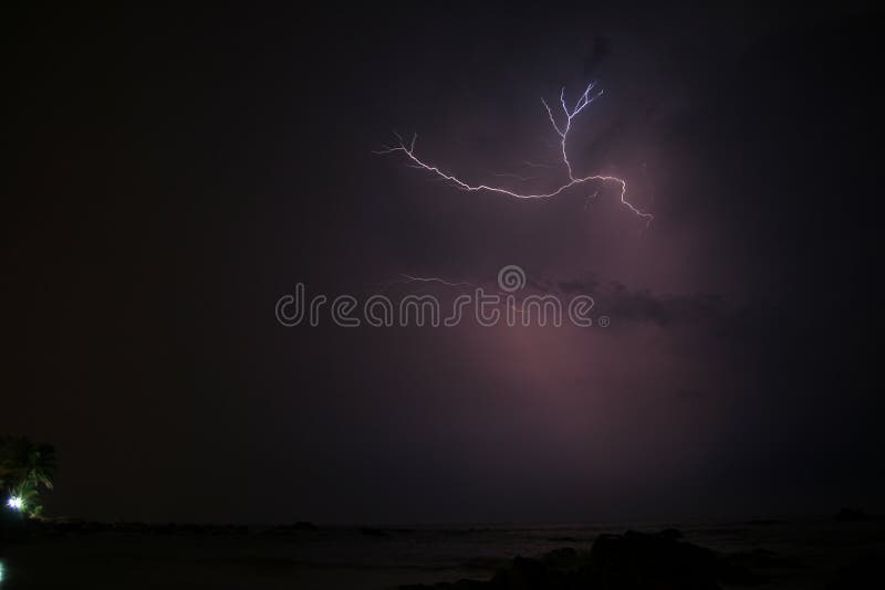 Small Lightning Strike in Sky Stock Photo - Image of beach, background ...