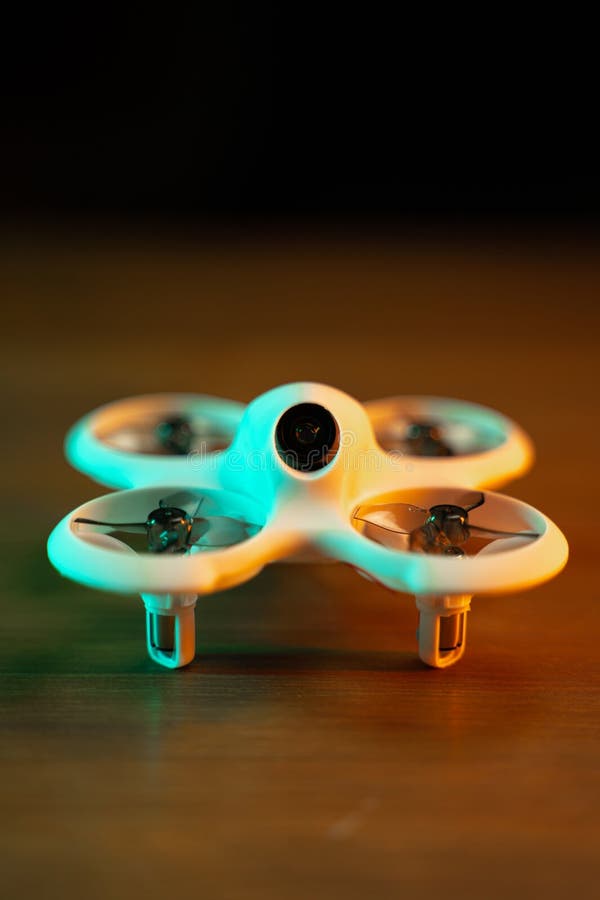Compact Indoor Drone on Wooden Table Stock Image - Image of wireless ...