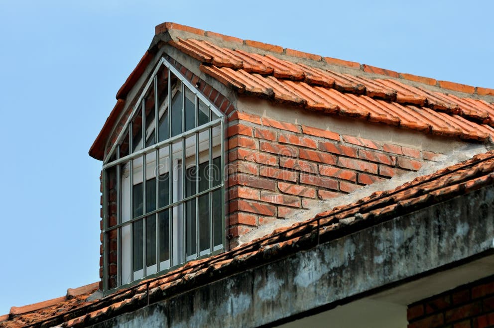 Small Loft Window on the Top of Building Stock Photo - Image of color ...