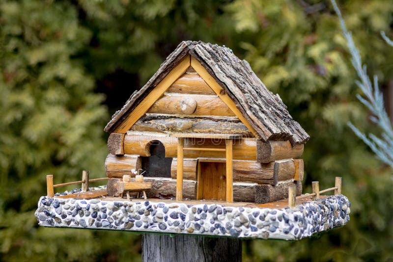 Small log cabin for birds stock image. Image of trees - 49067981