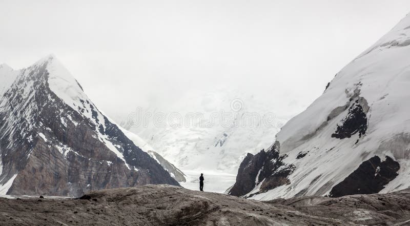 Small Man between Mountains Stock Photo - Image of tourist, background ...