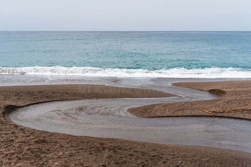 Small meander of a stream stock photo. Image of coastline - 211838122