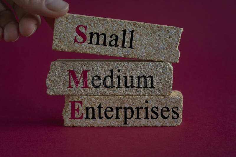 Small Medium Enterprise Concept on Brick Blocks. Beautiful Red ...