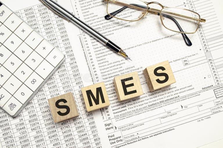 Small and Medium-sized Enterprises Word Written in Wooden Cubes on ...