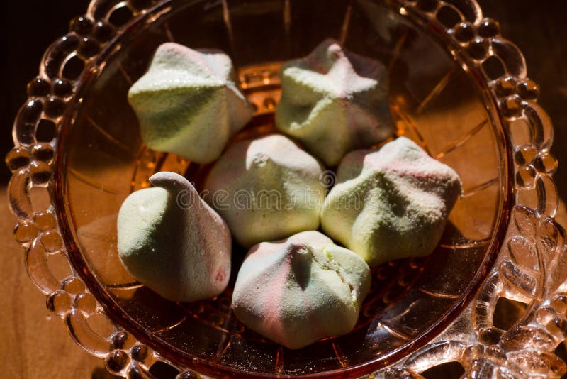Small Meringues in a Beautiful Vase. Sweets in the Sun Stock Photo ...