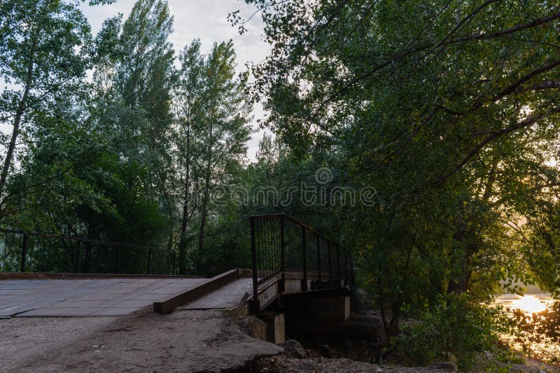 A Small Metal Bridge Near the River Stock Image - Image of countryside ...