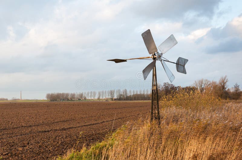 Small Metal Windmill in a Dutch Autumnal Landscape Stock Image - Image ...
