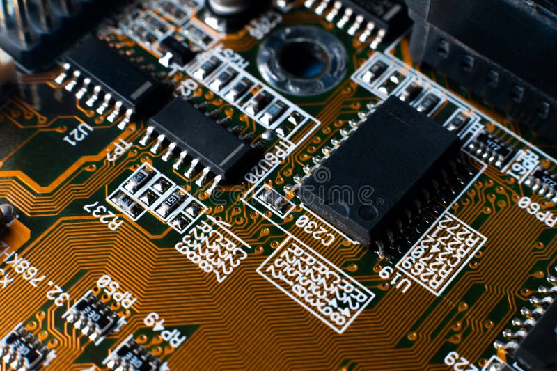 Small Microprocessor, Microcontroller Chip on a Generic Modern Desktop PC Computer Motherboard ...