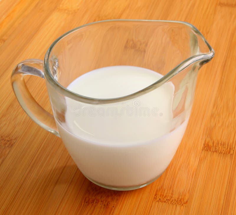 Small milk pitcher stock image. Image of liquid, white - 1988213
