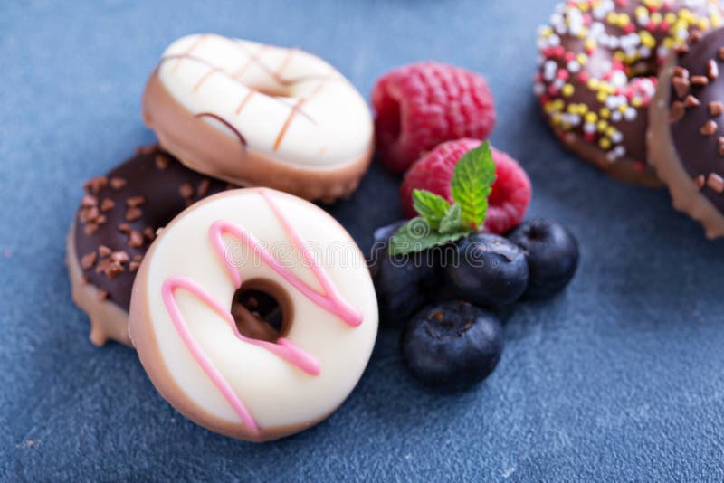 Small Mini Donuts with Fresh Berries Stock Photo - Image of fried ...