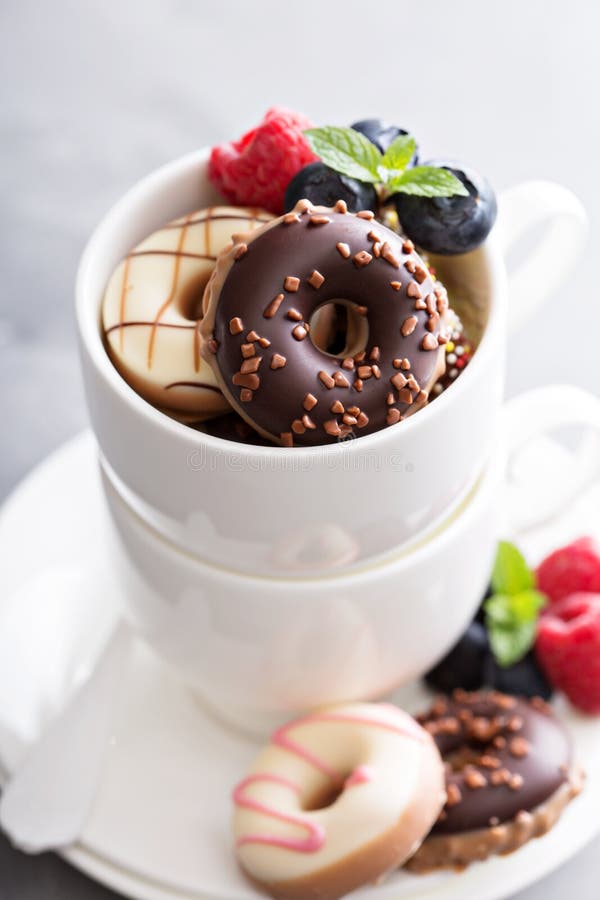 Small Mini Donuts in Stacked Coffee Cups Stock Photo - Image of cake ... Small Mini Donuts in Stacked Coffee Cups Stock Photo - Image of cake ...