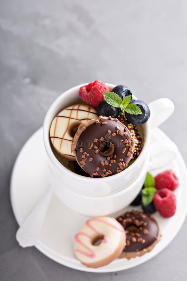 Small Mini Donuts in Stacked Coffee Cups Stock Photo - Image of group ...