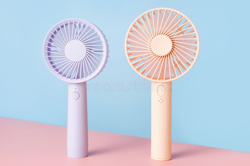 Small Mini Fans Blue Pink Background Close Up Stock Photos - Free ...