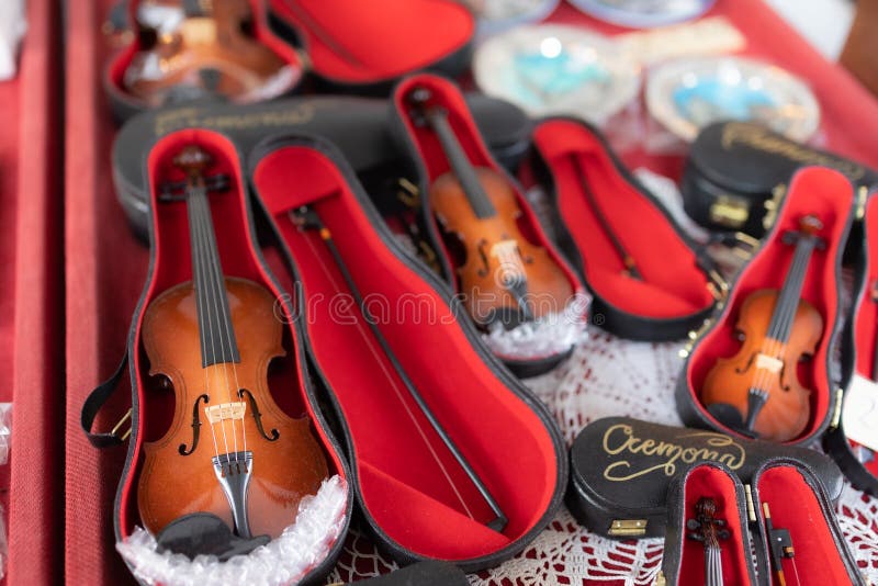 Small Miniature Violins with Their Stick and Red Case Editorial Photo ...