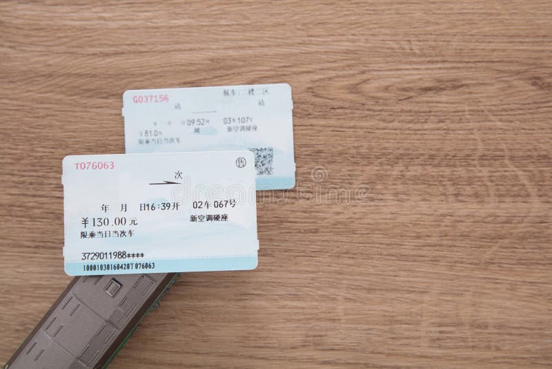 Small Model Train and Two Train Tickets on the Table Stock Image ...