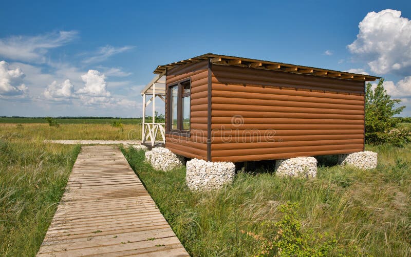 Small Modern House in a Clear Field Stock Image - Image of spring ...