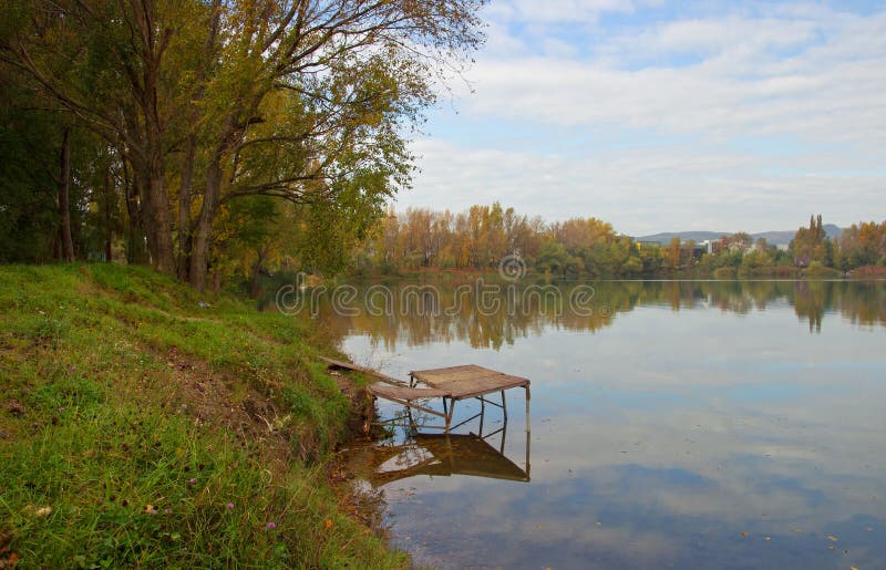 Small Mole on Lake Shore stock photo. Image of autumn - 46917956