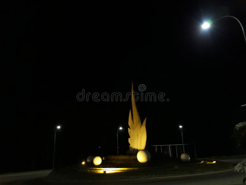 A Small Monument in the Middle of the Road with Small Lights, in Jember ...