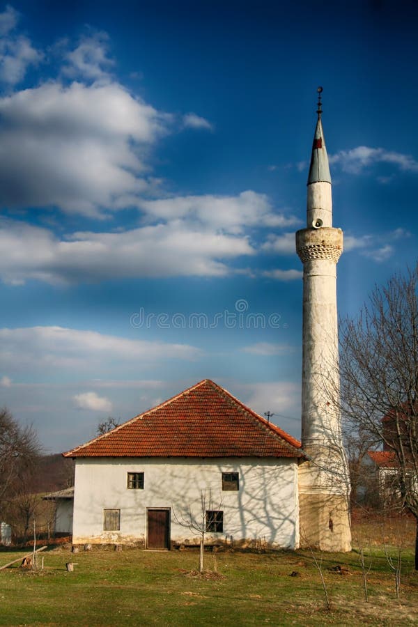 Small mosque with minaret stock image. Image of city - 91462807