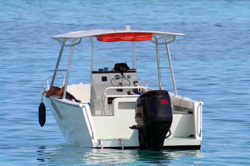 Small motor boat stock photo. Image of lagoon, calm, outboard - 739362
