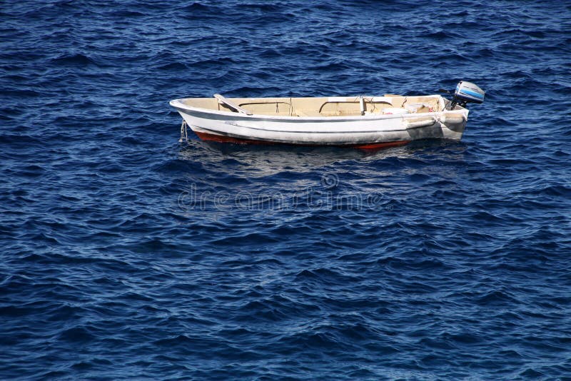 Small Motor Boat on the Deep Blue Sea Stock Photo - Image of engine ...