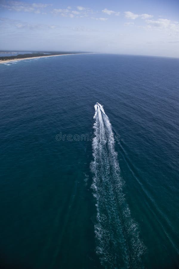 Small Motor Boat Cruising through Ocean Pass Stock Image - Image of ...
