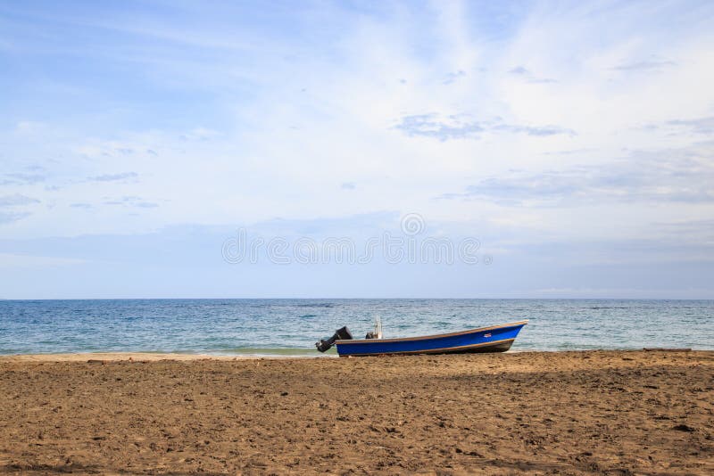 Small Motor Boat on Sand Beach Stock Photo - Image of moored, transport ...