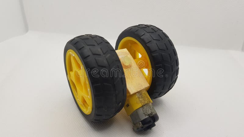 Small Motor with Wooden Mount and Wheels Stock Photo - Image of angle ...