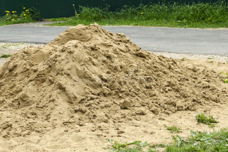 The Small Mountain of River Sand is Poured Out on the Road for ...