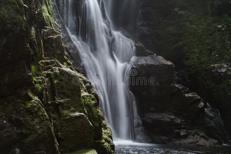 Small mountain waterfall stock photo. Image of view - 110546576