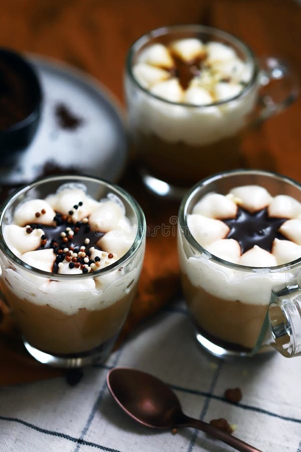 Small Mugs with a Three-layer Coffee-caramel Dessert. Delicious Pudding ...