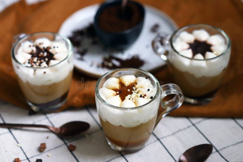 Small Mugs with a Three-layer Coffee-caramel Dessert. Delicious Pudding ...