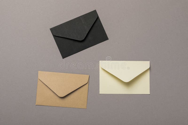 Small Multi-colored Envelopes on a Gray Background Stock Photo - Image ...
