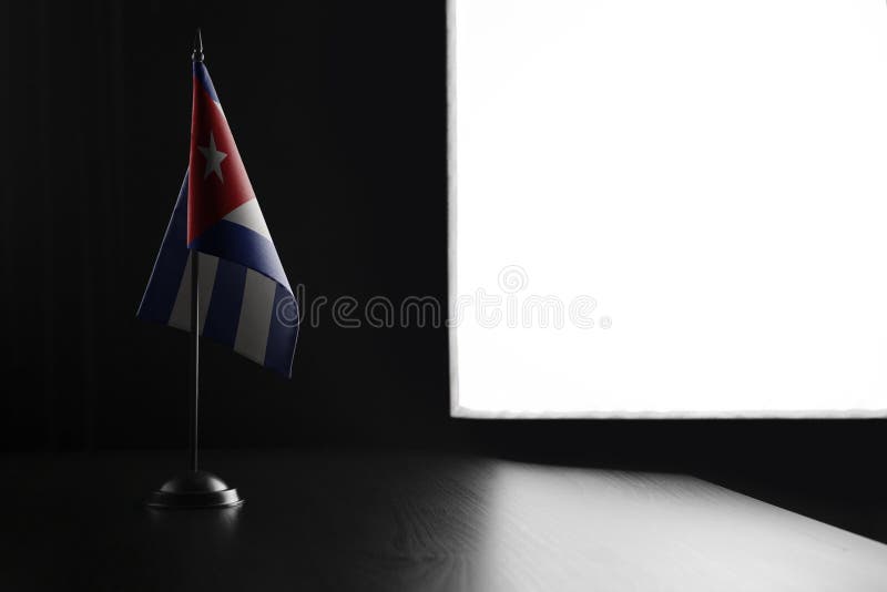 Small National Flag of the Cuba on a Black Background Stock Photo ...
