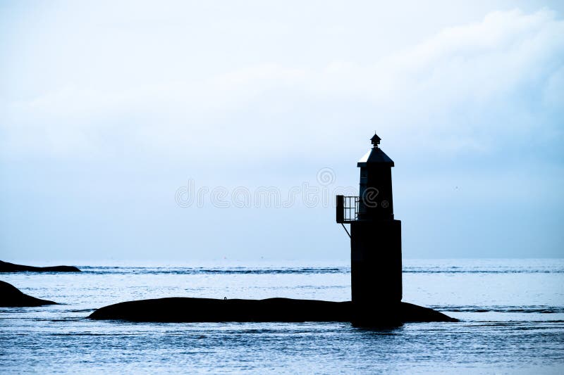 Small Navigational Light on a Tiny Skerry at Sea.. Stock Photo - Image ...