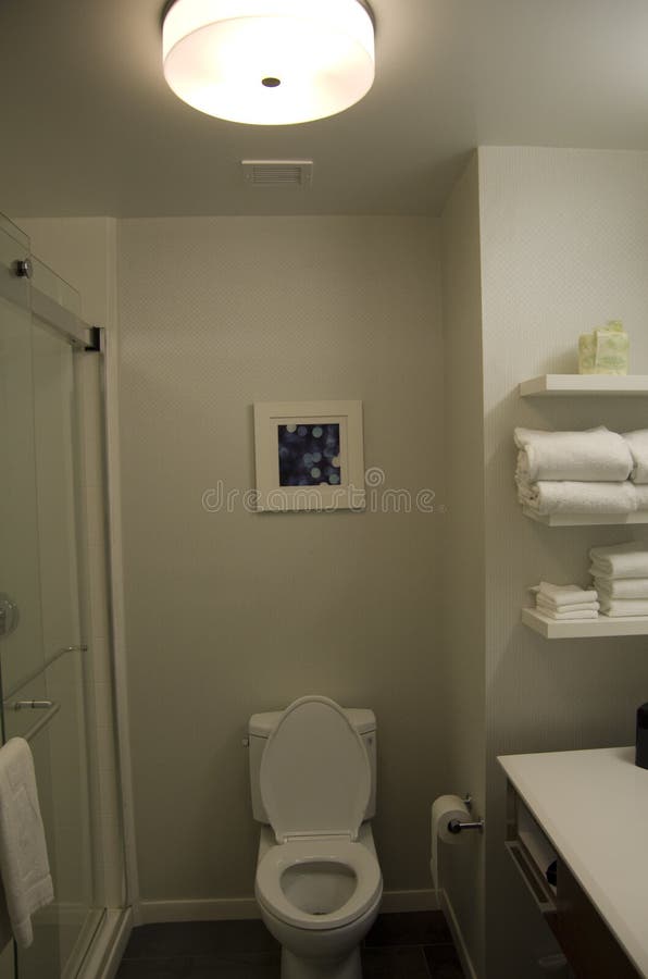 Small Neat Hotel Bathroom Design Stock Photo - Image of tower, bathroom ...