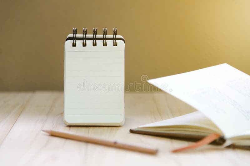 Small Note Book Paper Notepad Stand on Wood Table for Writing an ...