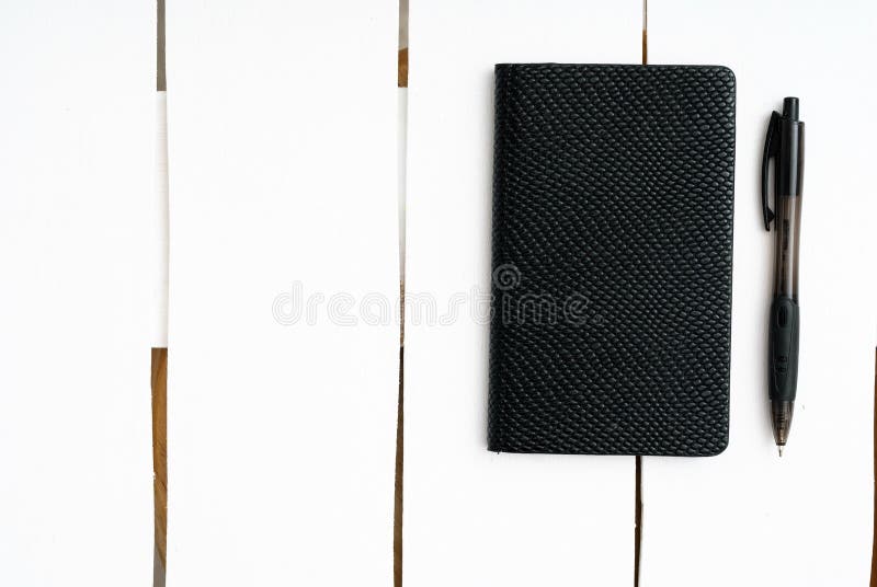 Small notepad with pen stock photo. Image of creative - 78086484