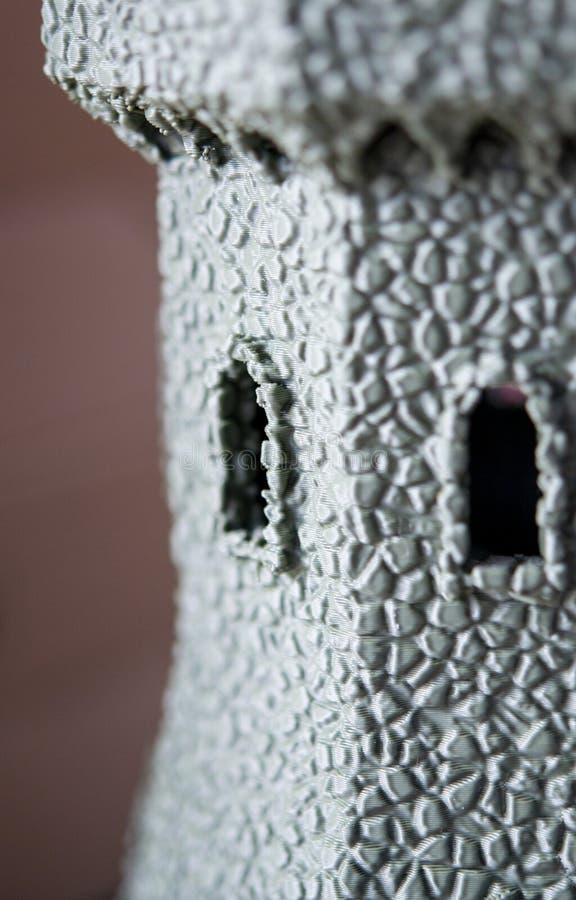 Small Object Created from Molten Plastic on 3D Printer. Three ...