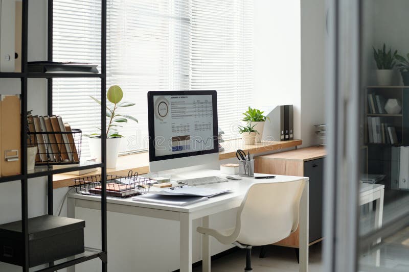 Small Office Workplace with Statistics Graphics on PC Screen Stock ...