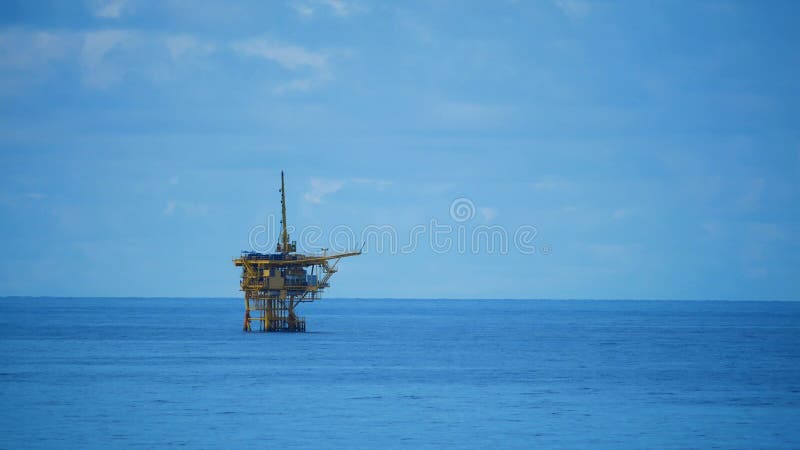 Offshore Oil Rig in the Middle of the Ocean. Massive Industrial ...