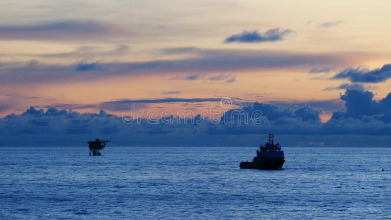 Offshore Oil Rig in the Middle of the Ocean. Massive Industrial ...
